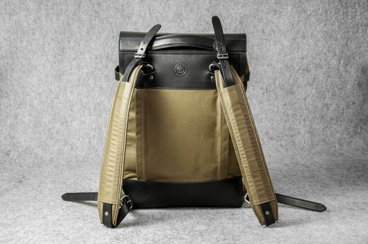tan designer backpack